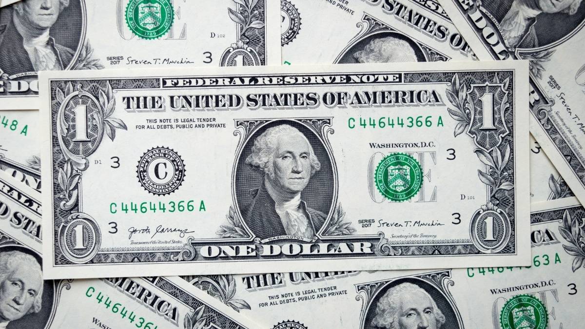Qui figure sur le billet d'1 dollar ? Histoire, symboles et faits ...